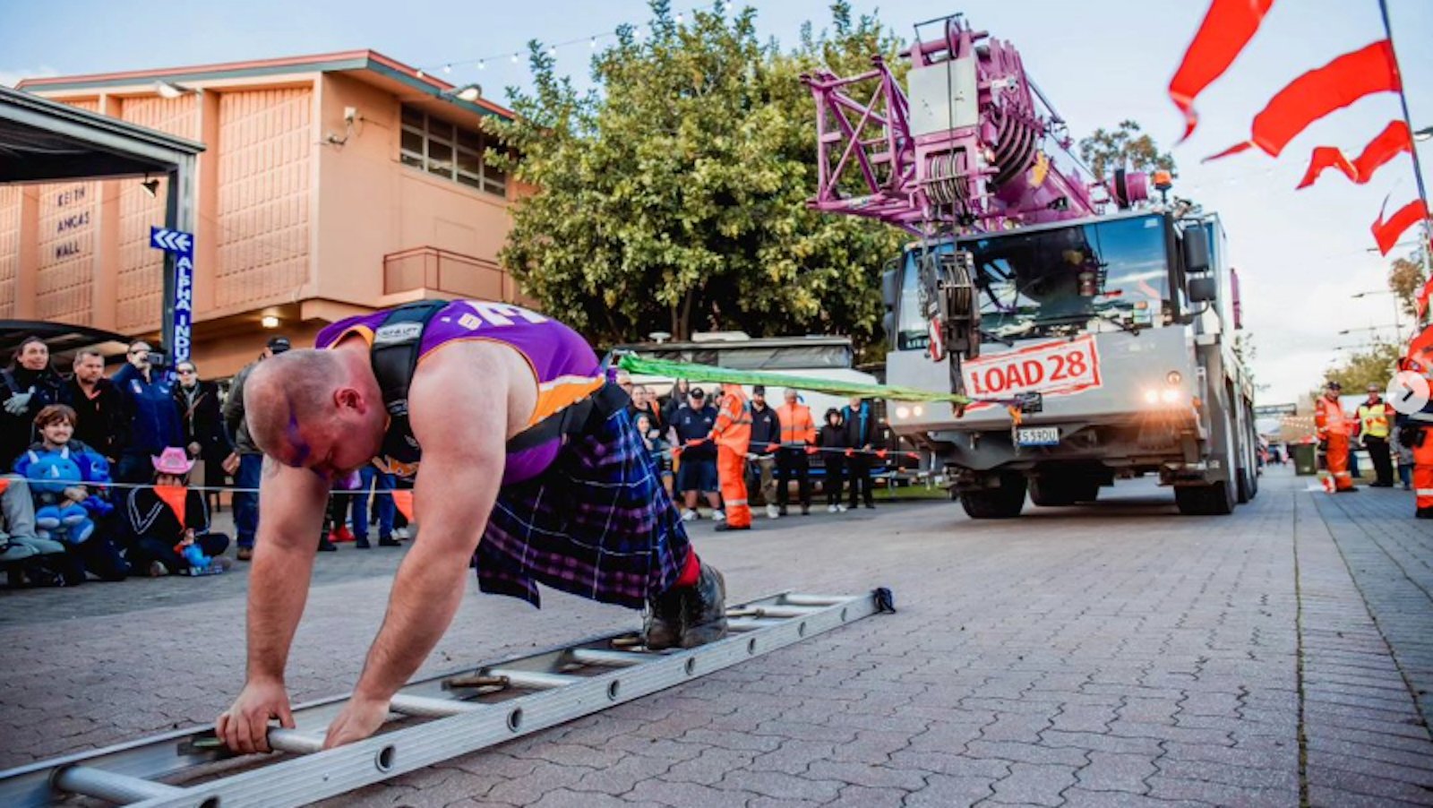 Australian Strongman Smashes World File by Pulling 44,753-Pound Crane ...
